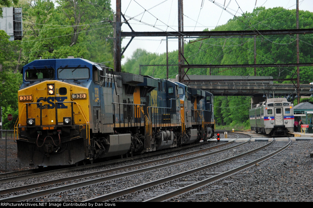 Q418-08 backs towards their train